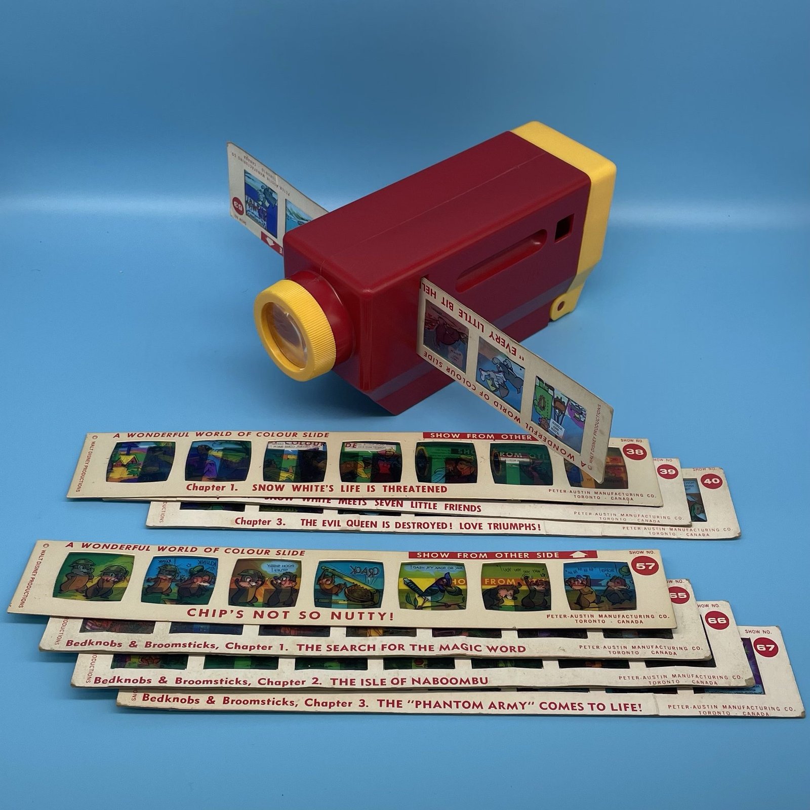 Disney Magna-Slide Projector with 8 Films 1960s - SellingThings.ca